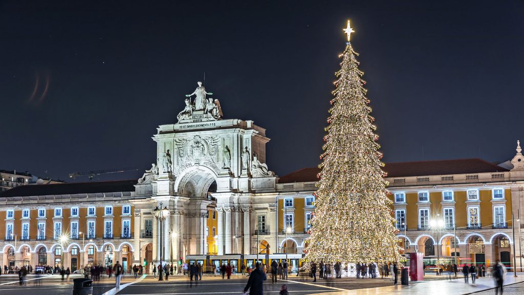 Commerce Square Illuminated with a Towering Christmas Tree in Lisbon ...